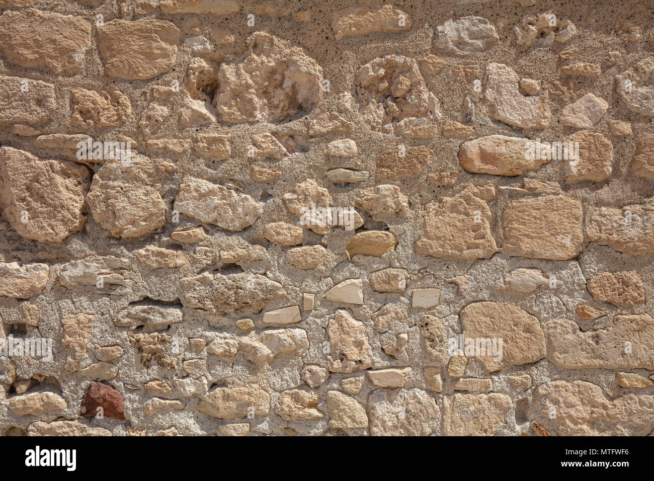 Traditional weathered sand stone wall background in Cyprus Stock Photo ...