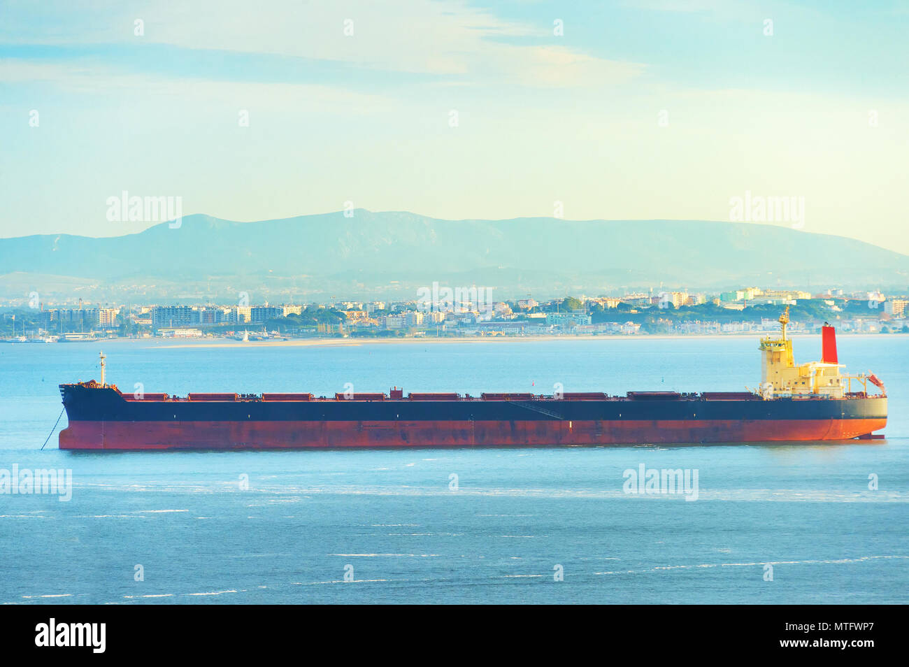 Large cargo shipping tanker on Tagus river in Lisbon, Portugal Stock ...