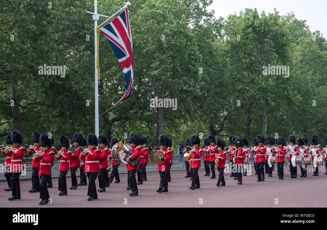 London UK. Military band marches down the The Mall outside Buckingham ...