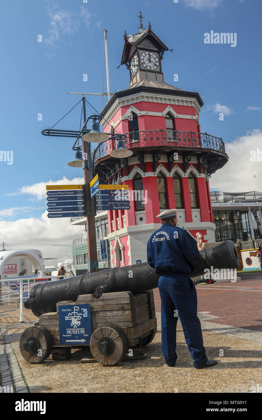 Clock, cannon and security in cape town harbour, cape town, south ...
