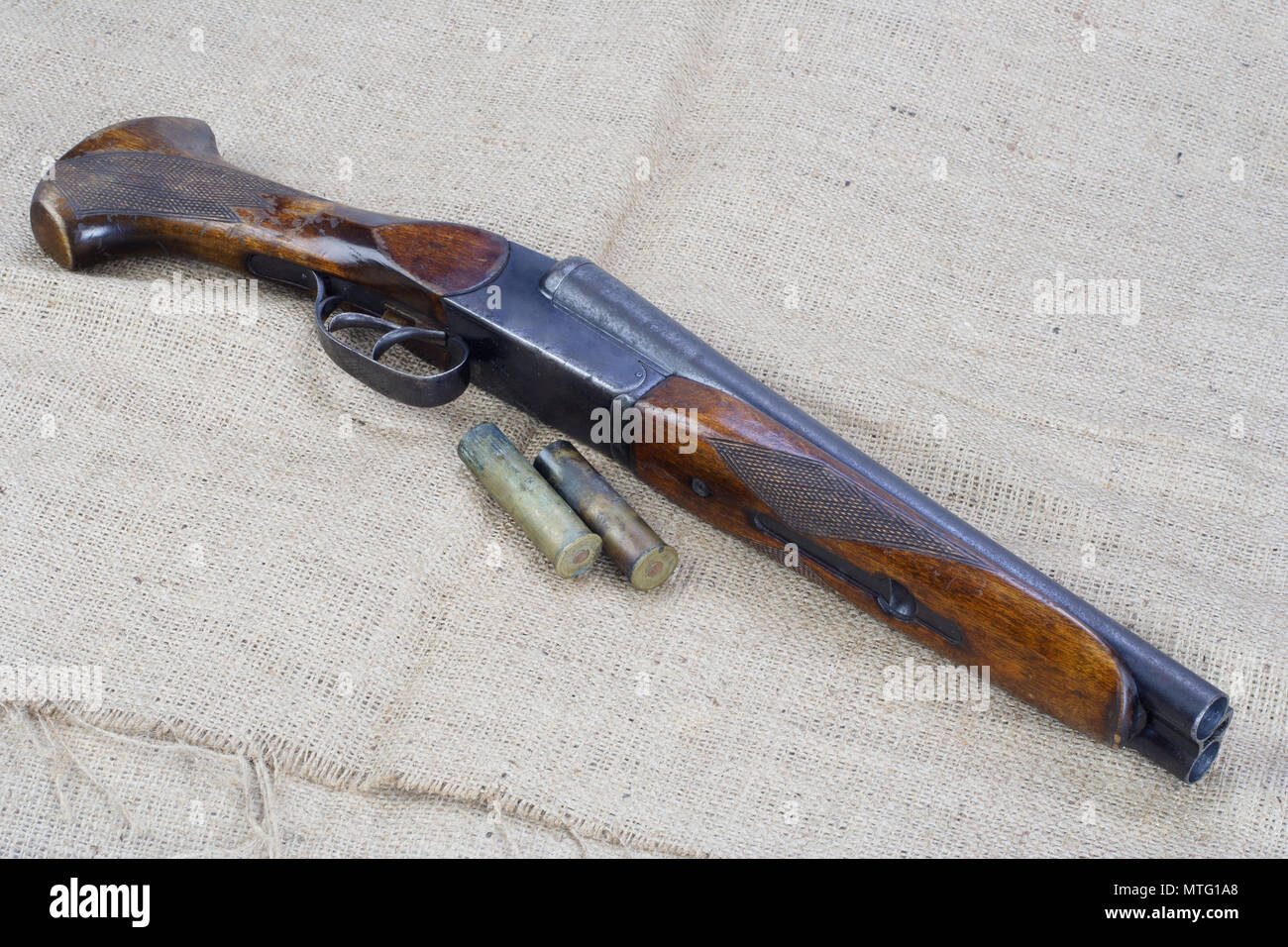 Sawn-off shotgun with cartridges Stock Photo - Alamy