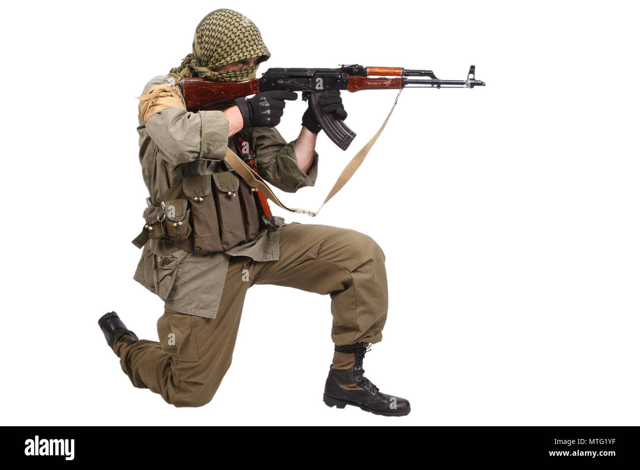 guerilla with AK 47 isolated on white Stock Photo - Alamy