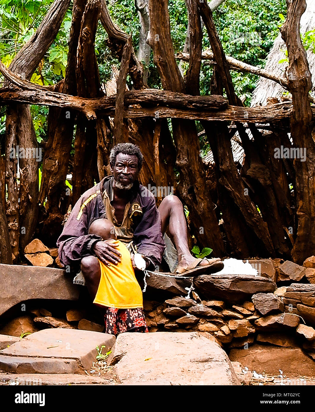 Konso aka Xonsita tribe man with baby in national dress - 03 october ...