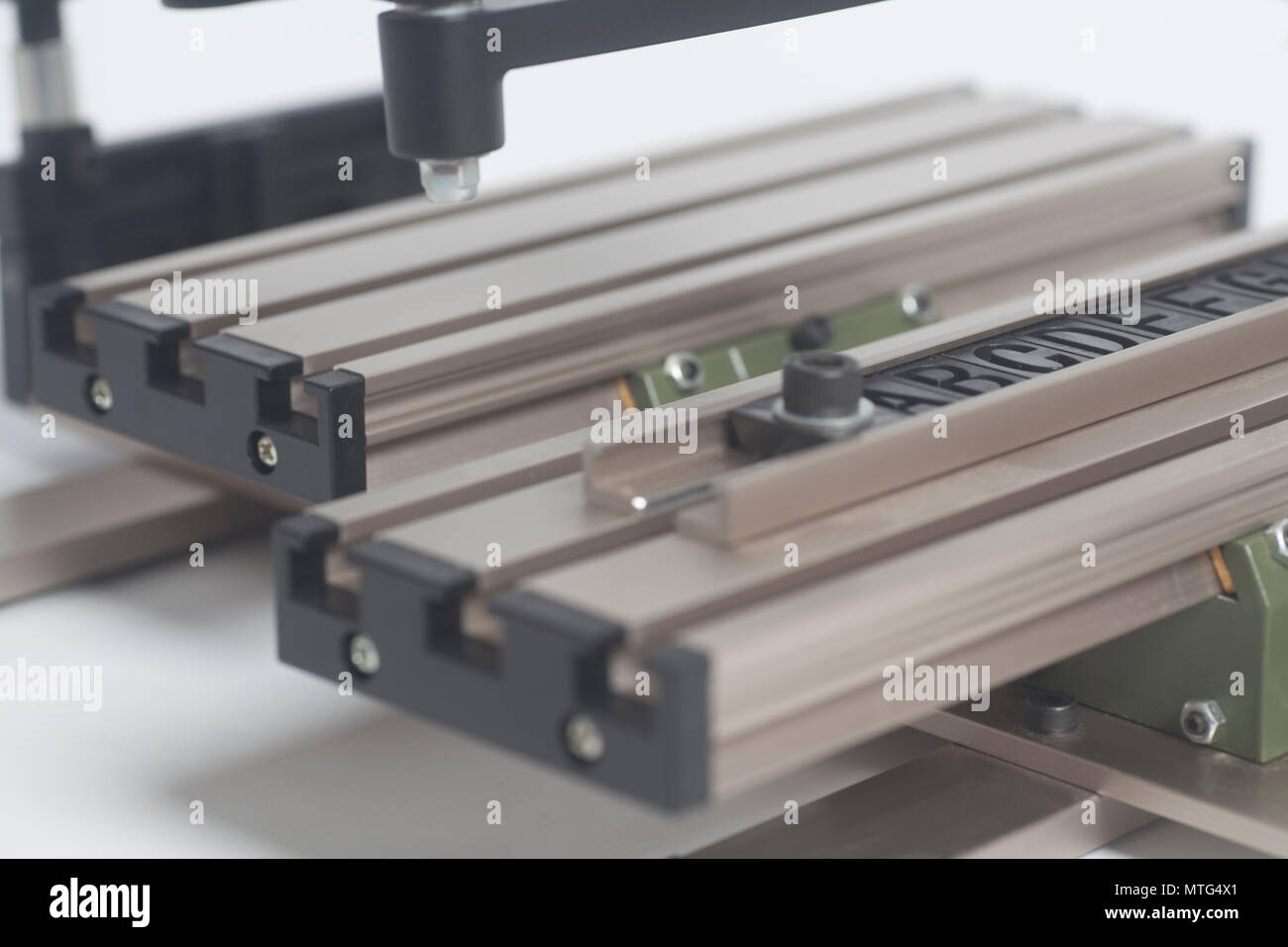 Engraving device pantograph with letterpress alphabet on a white ...