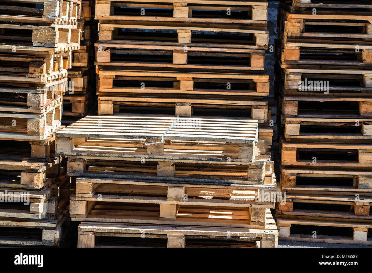 Stacked wooden pallets Stock Photo - Alamy