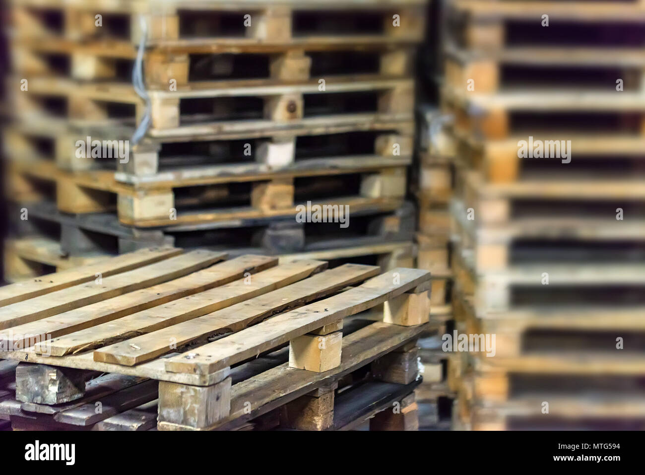 Stacked wooden pallets Stock Photo - Alamy