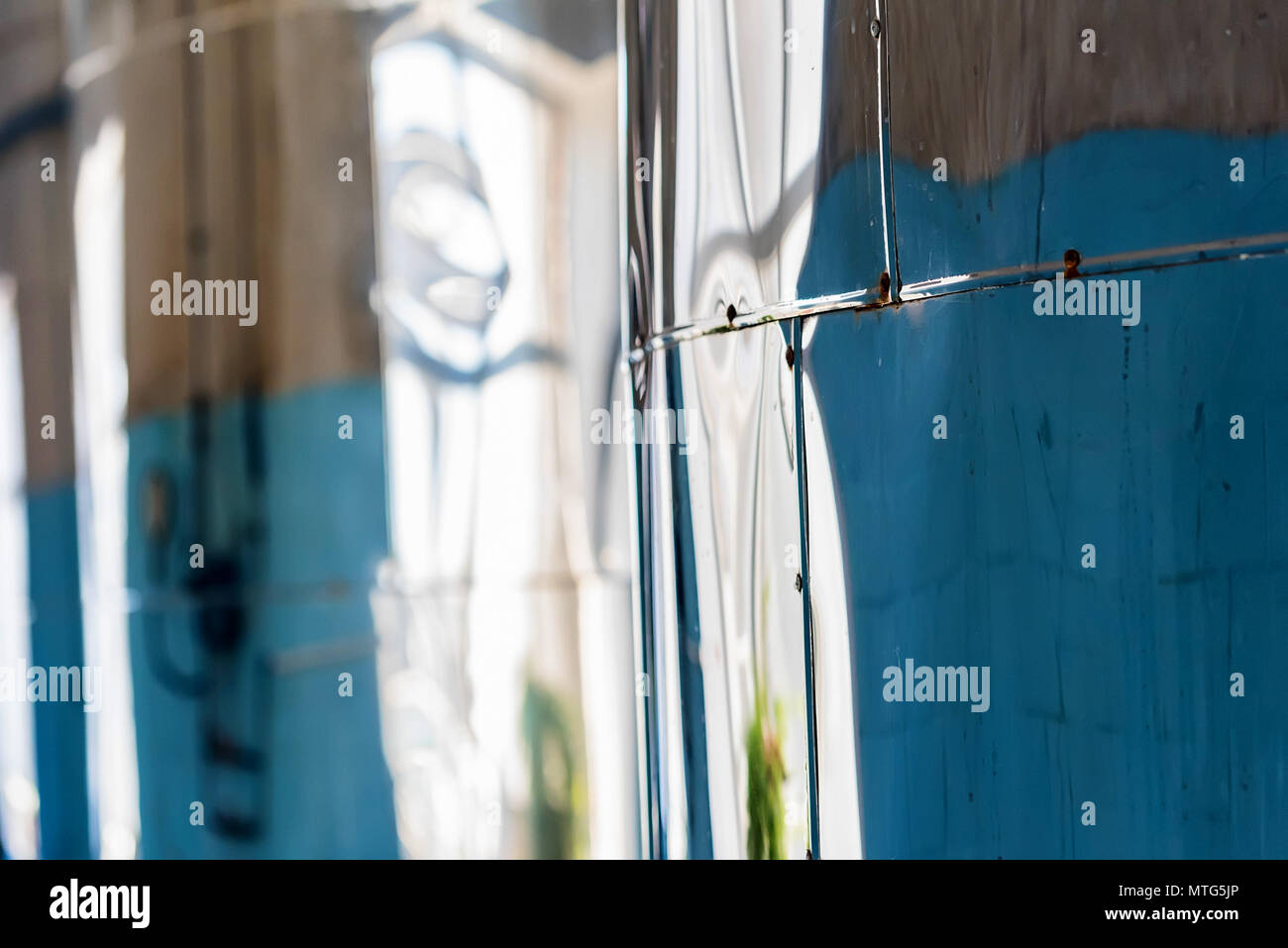 Chrome wine tank at modern winery close Stock Photo - Alamy