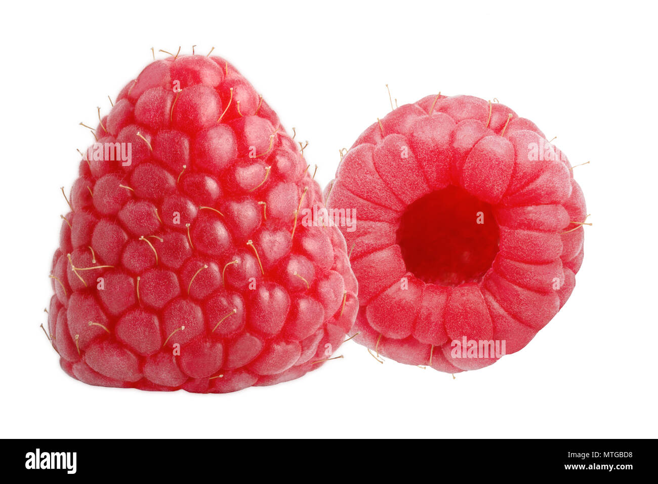 Isolated berries. Two raspberries isolated on white background with ...