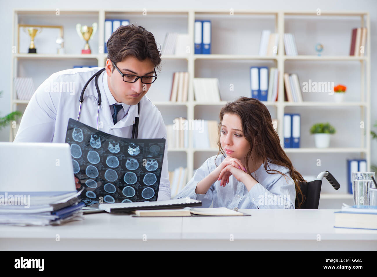 Doctor feeling pessimistic about x-ray image of patient Stock Photo - Alamy