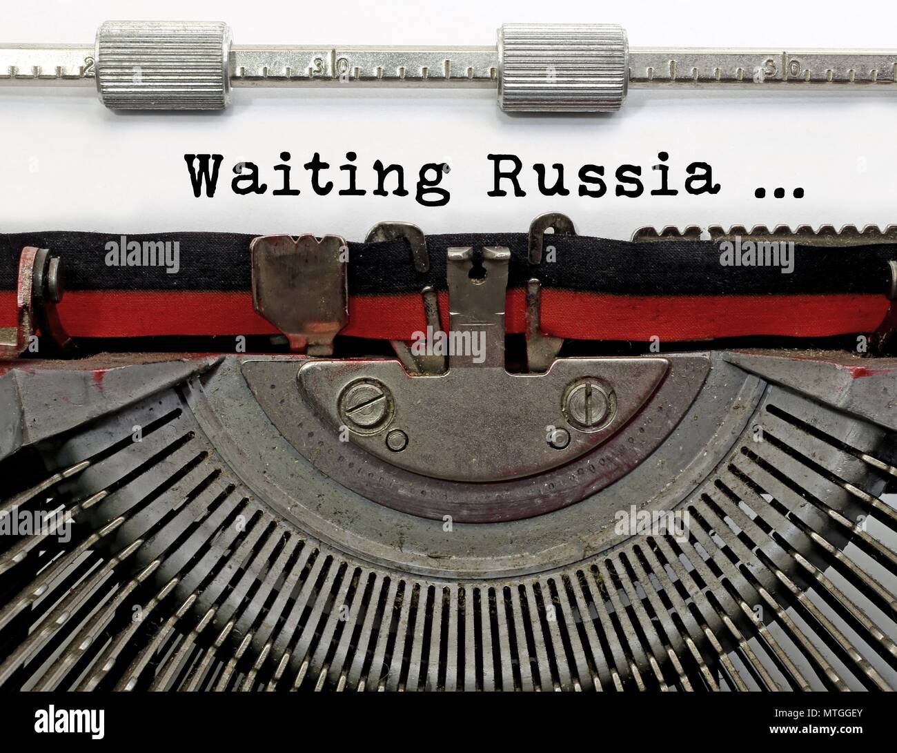Waiting Russia text typed by hand on the old typewriter with black ink ...