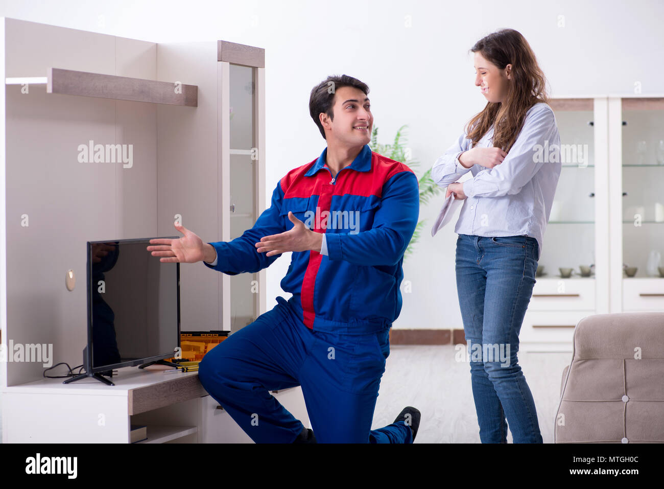 Tv repairman hi-res stock photography and images - Alamy