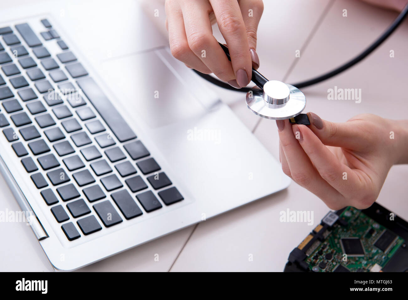 Hard drive repair and data recovery with restoration Stock Photo - Alamy