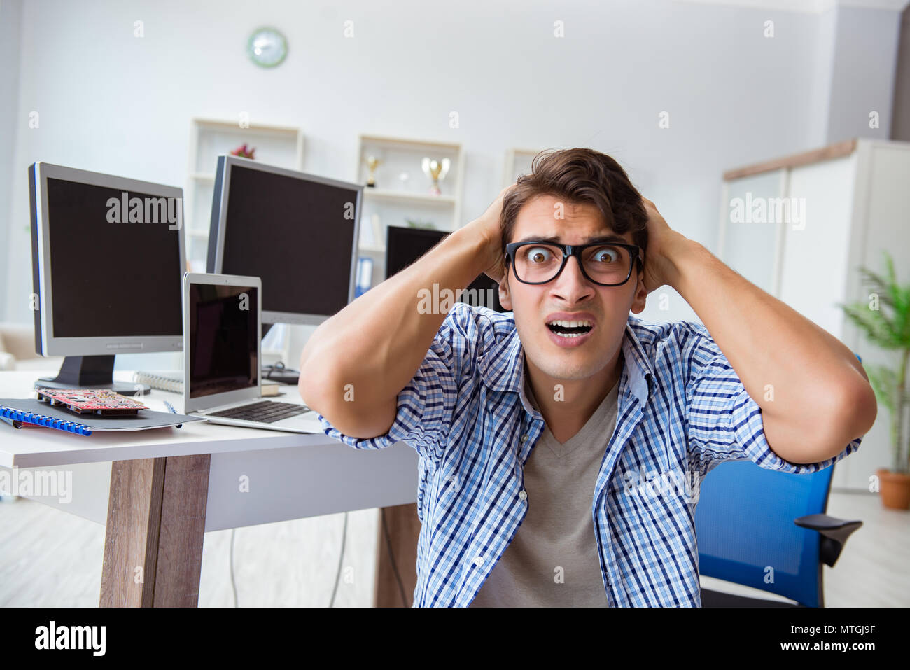Man In Front Of Many Screens High Resolution Stock Photography and ...