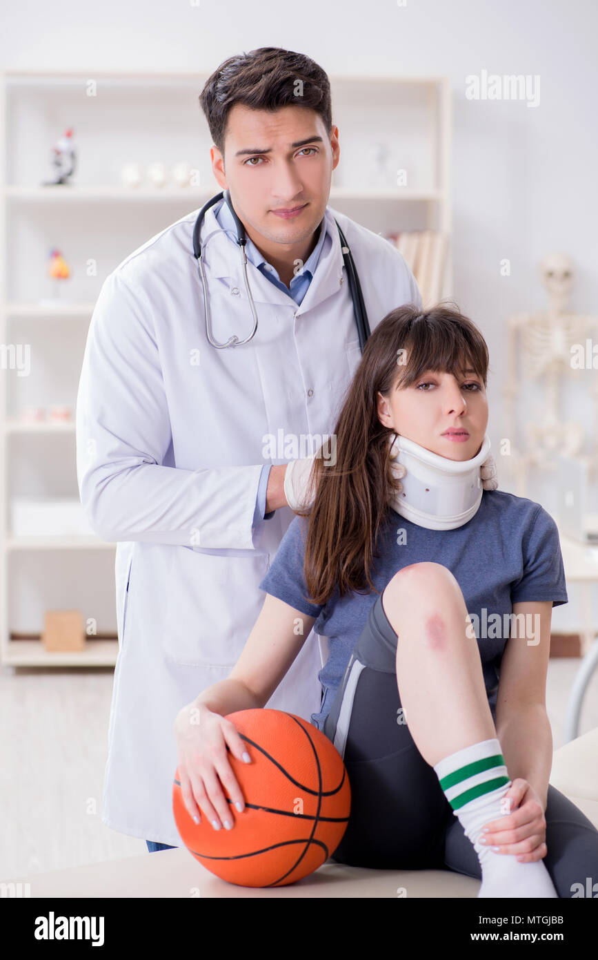 Female basketball player visiting doctor after injury Stock Photo - Alamy