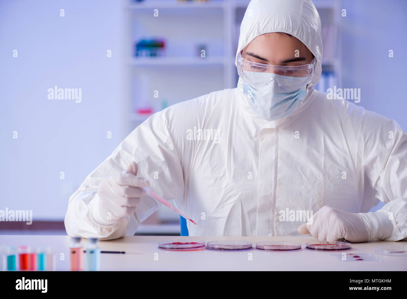 Lab assistant testing blood samples in hospital Stock Photo - Alamy