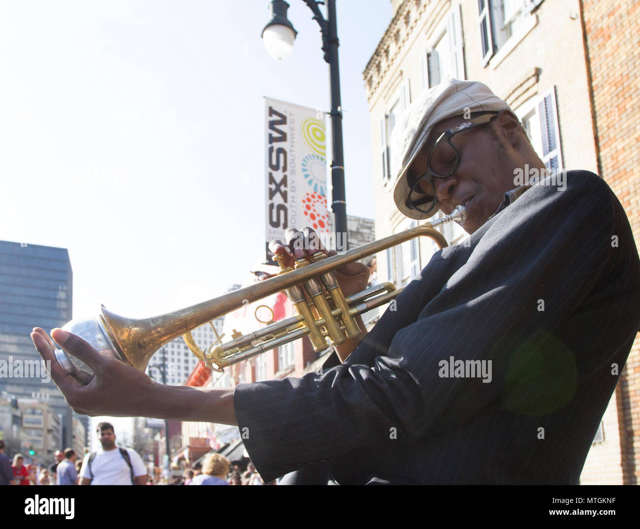 American woman playing trumpet hi-res stock photography and images - Alamy