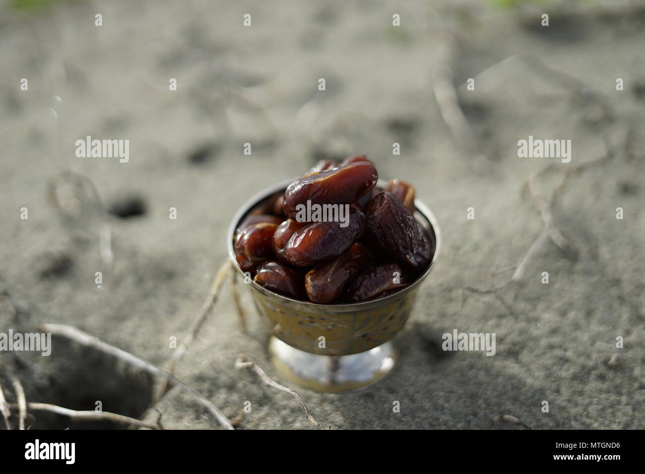 Date Fruit in Vintage Silver Plate Stock Photo - Alamy