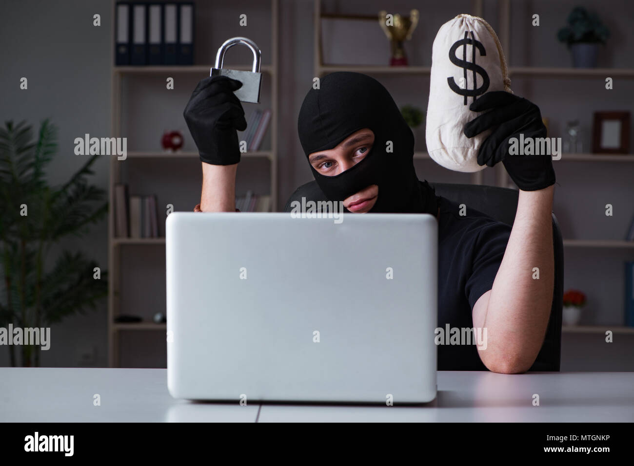 Hacker hacking computer late at night Stock Photo - Alamy