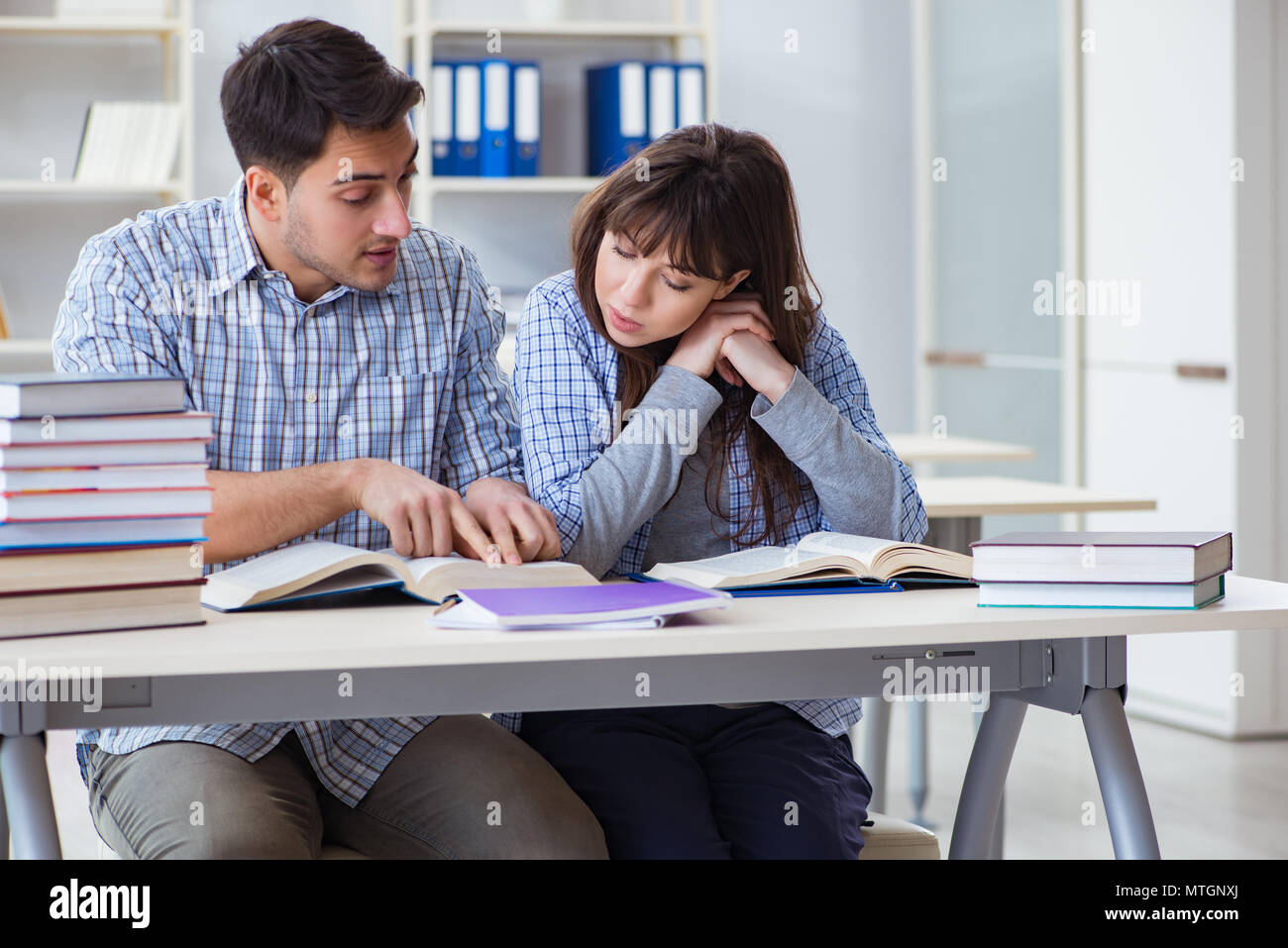 Students sitting and studying in classroom college Stock Photo - Alamy