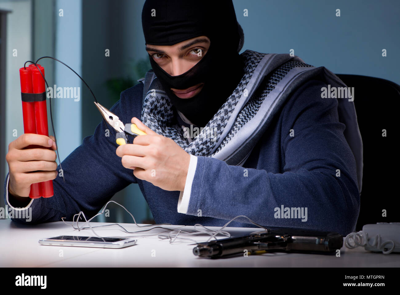Terrorist bomber preparing dynamite bomb Stock Photo - Alamy