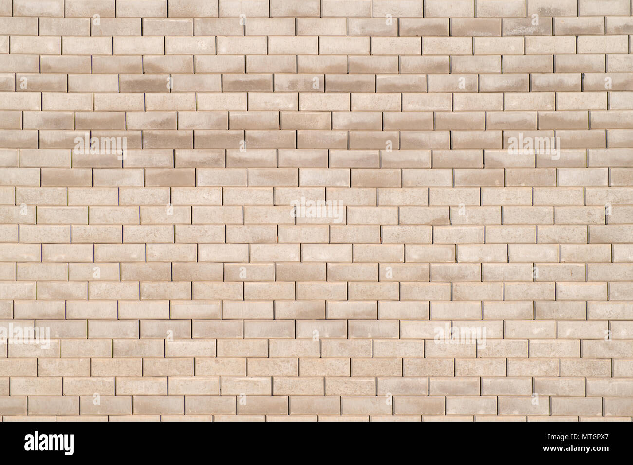 Beige brick wall texture hi-res stock photography and images - Alamy