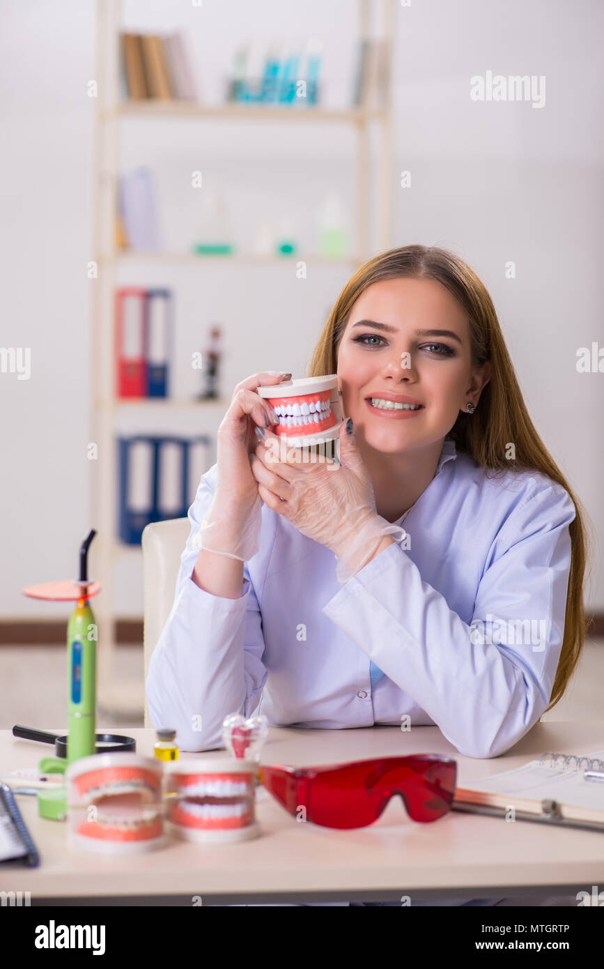 Dentistry student practicing skills in classroom Stock Photo - Alamy