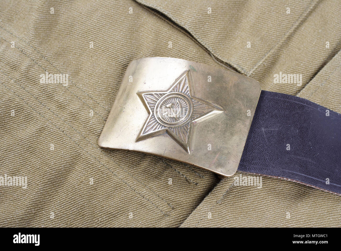 vintage buckle on USSR Soviet Army khaki uniform background Stock Photo ...
