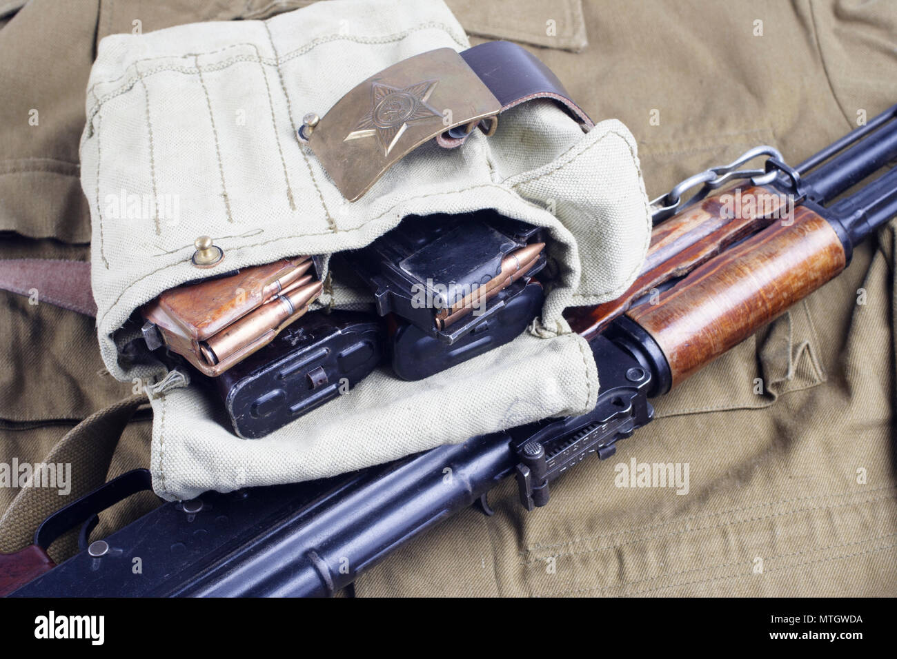 AK47 on USSR Soviet Army khaki uniform background Stock Photo - Alamy