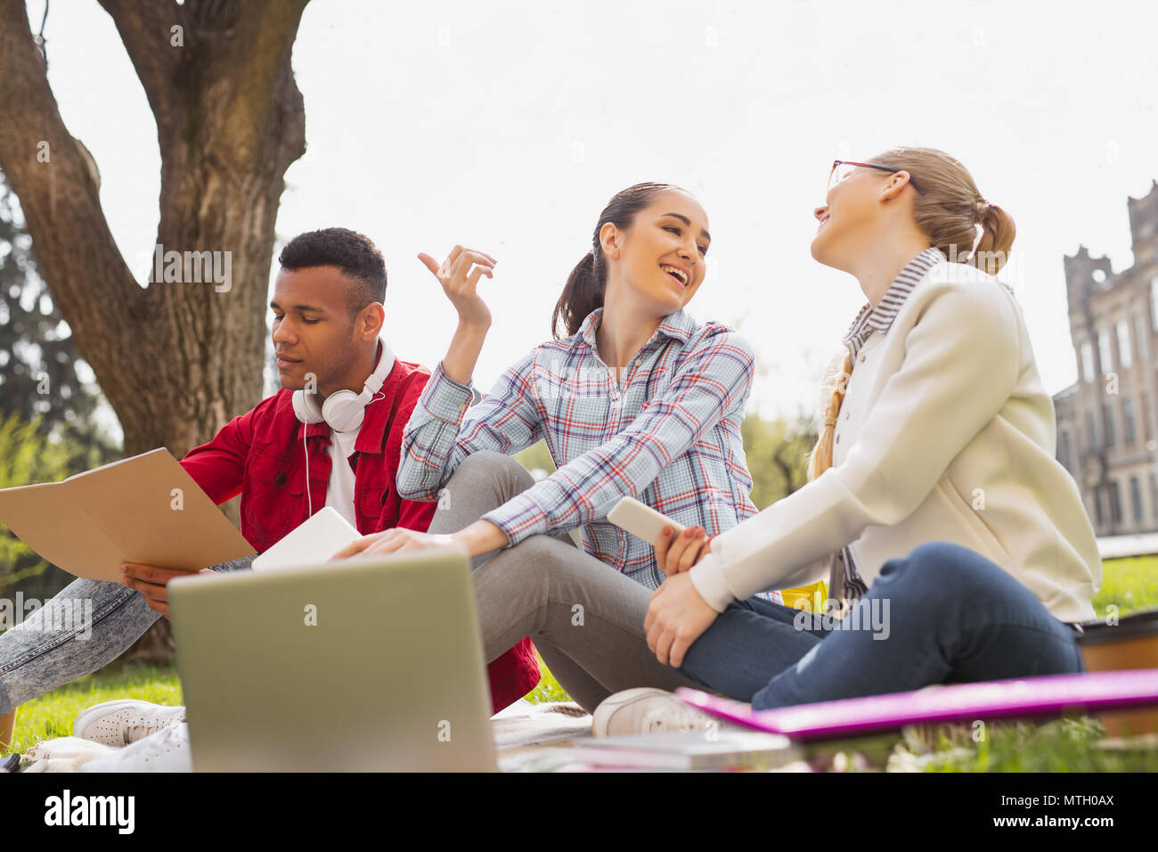 Two girls feeling unbelievable discussing positive news Stock Photo - Alamy