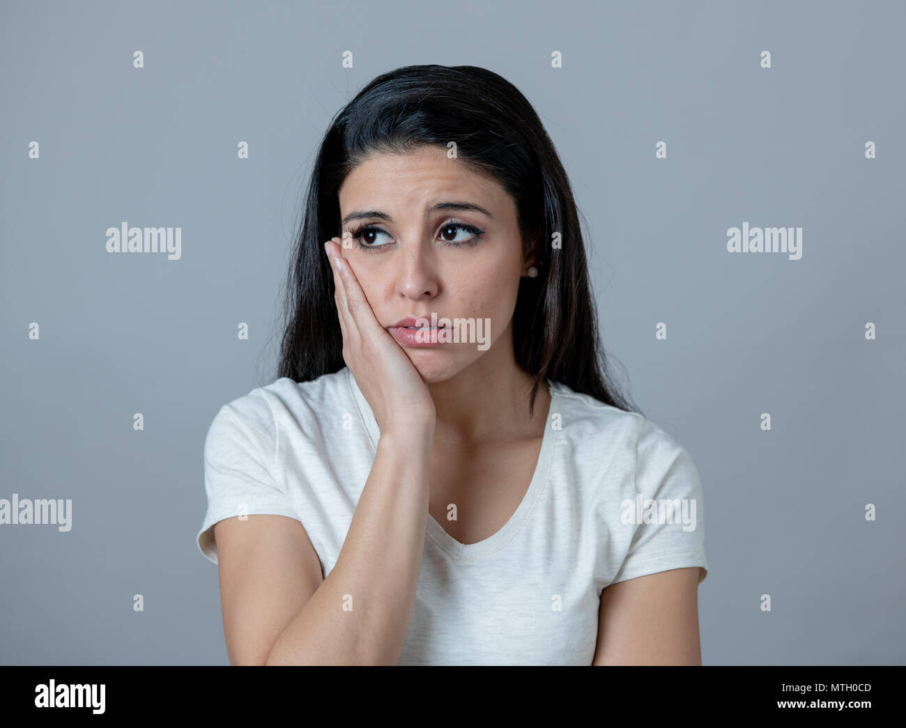 Close up portrait of a beautiful young latin hispanic woman with a ...