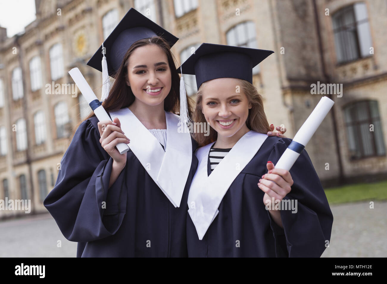 Receiving diploma hi-res stock photography and images - Alamy