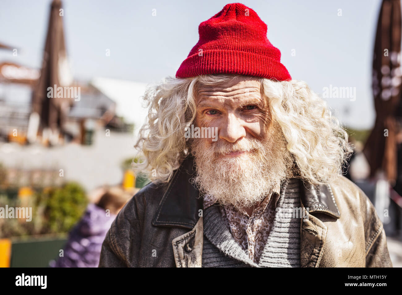 Positive homeless man looking at you Stock Photo - Alamy
