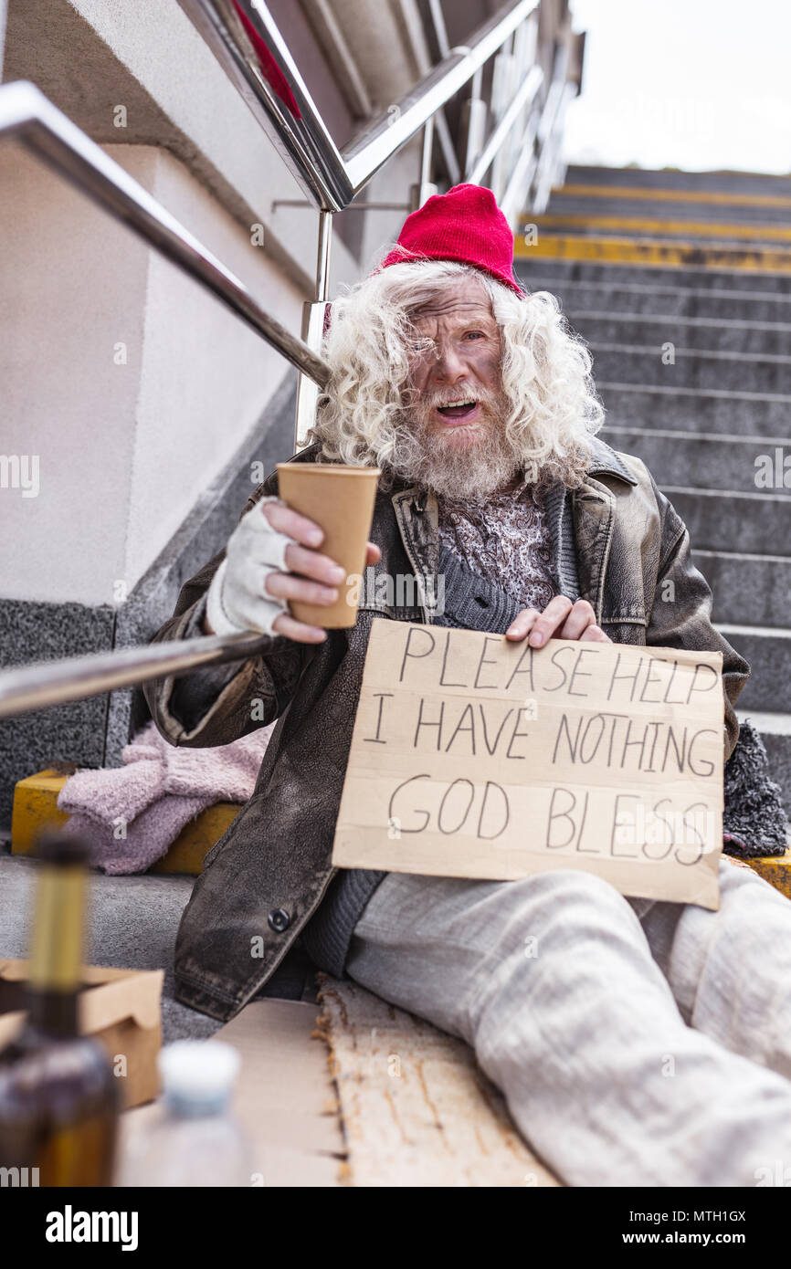 Homeless money hat hi-res stock photography and images - Alamy