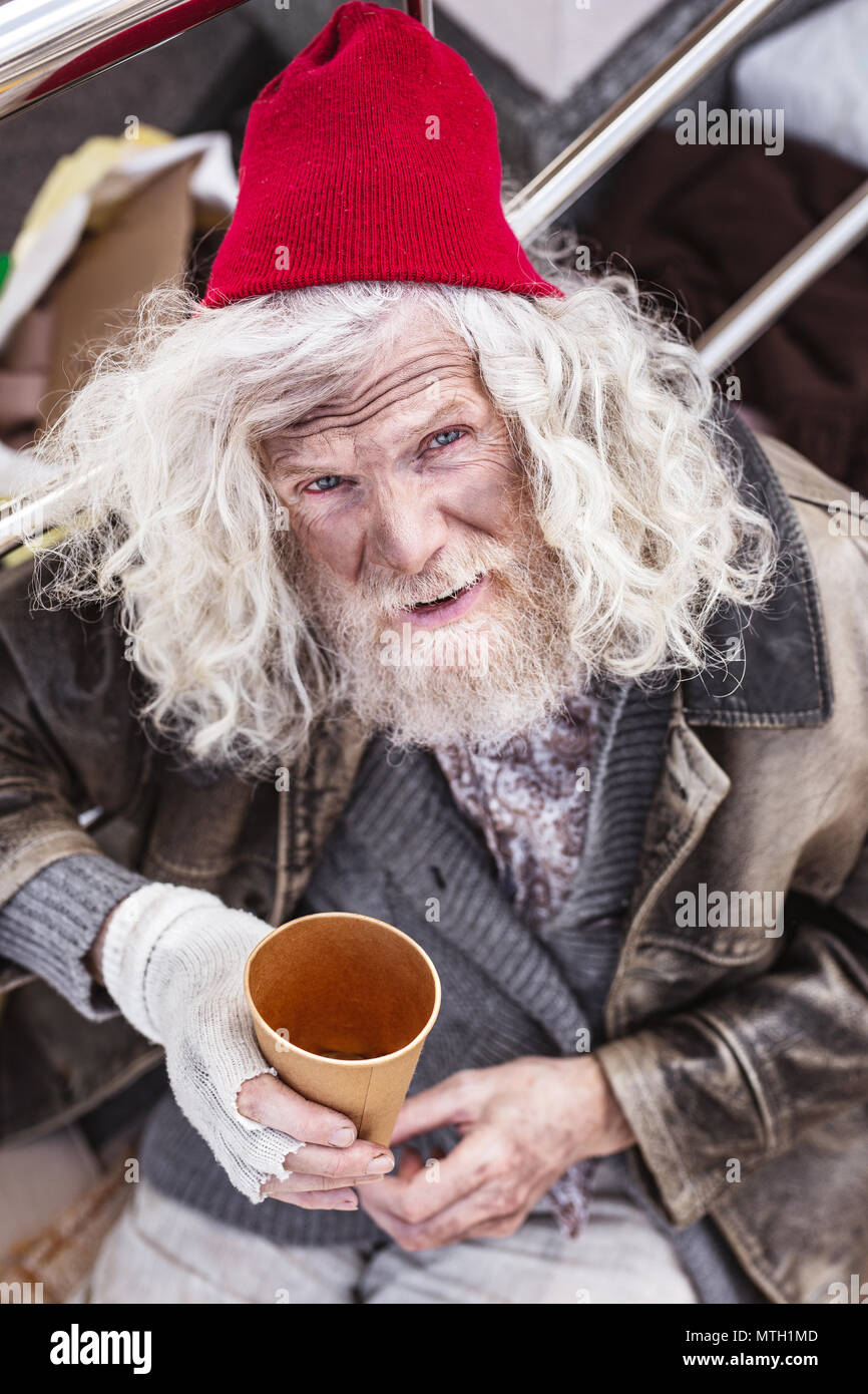 Homeless money hat hi-res stock photography and images - Alamy