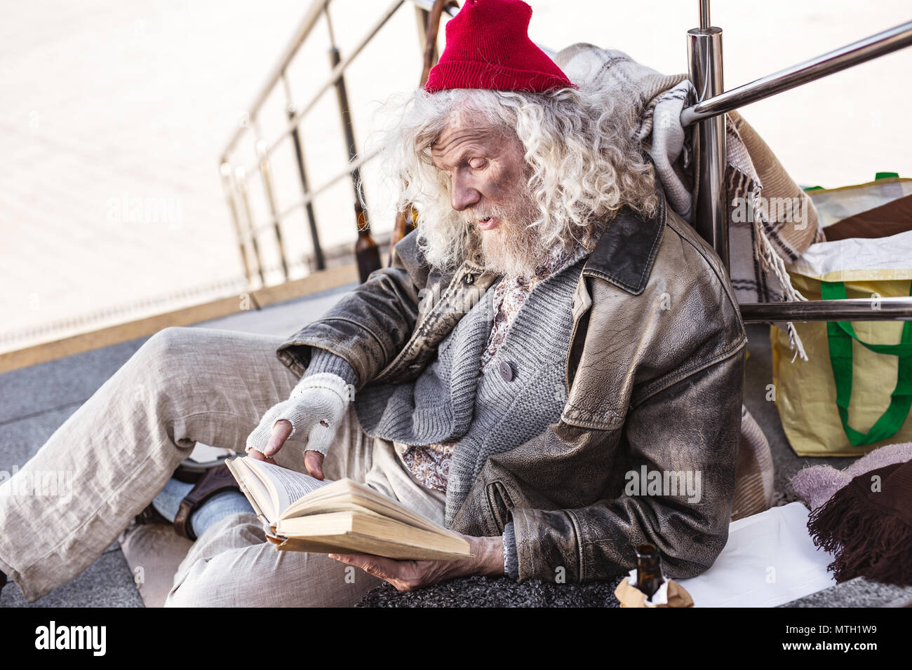 Nice homeless man resting Stock Photo - Alamy