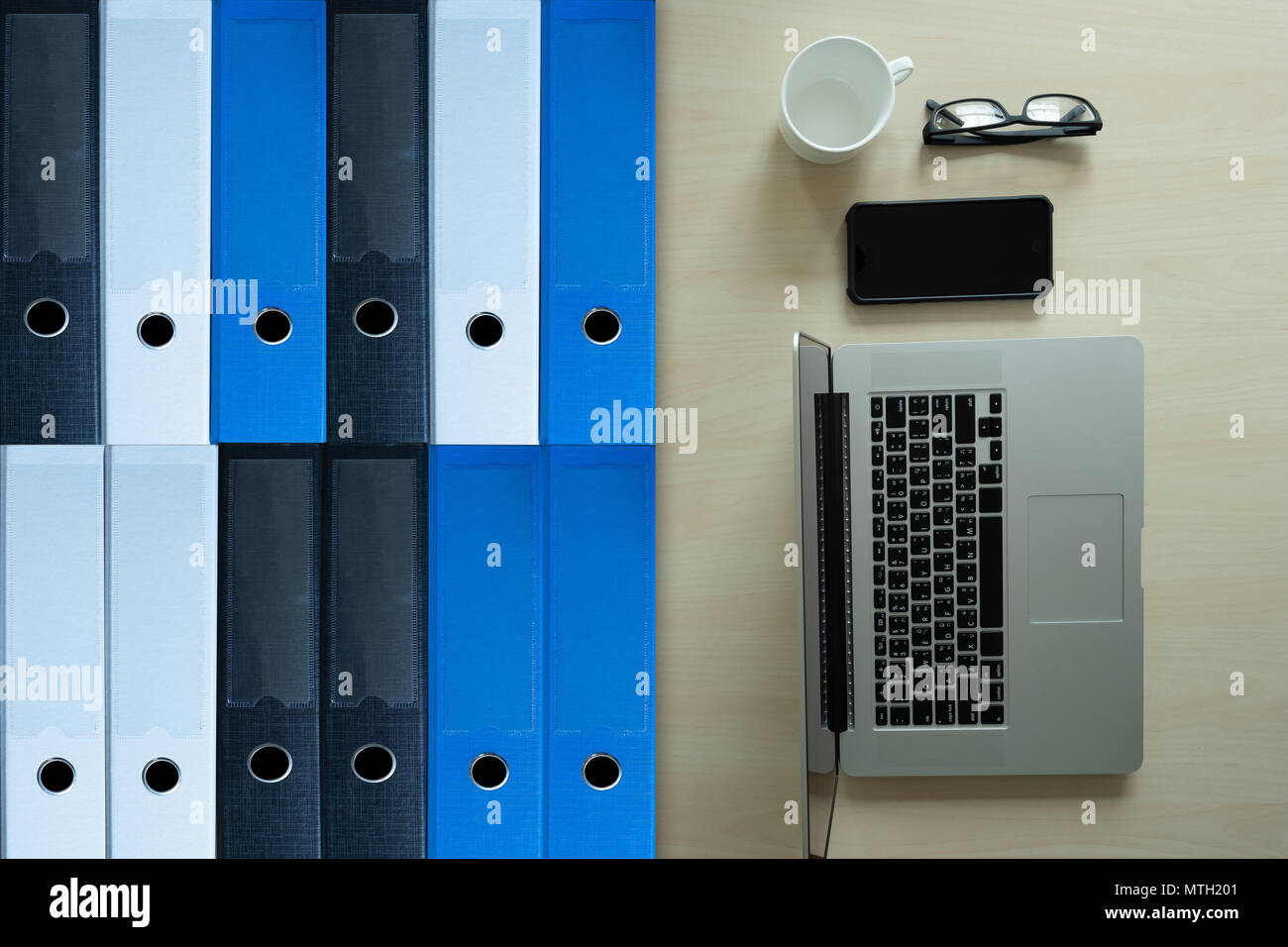 top view on phone business archive files into a filing data storage ...