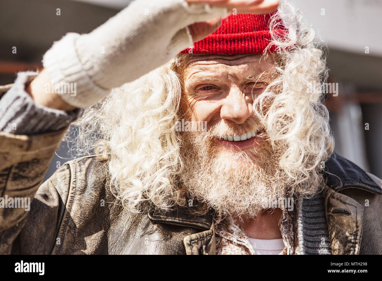 Portrait of a happy poor man Stock Photo - Alamy