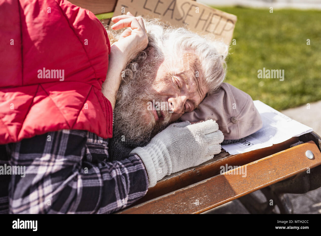Poor elderly man sleeping on the bench Stock Photo - Alamy