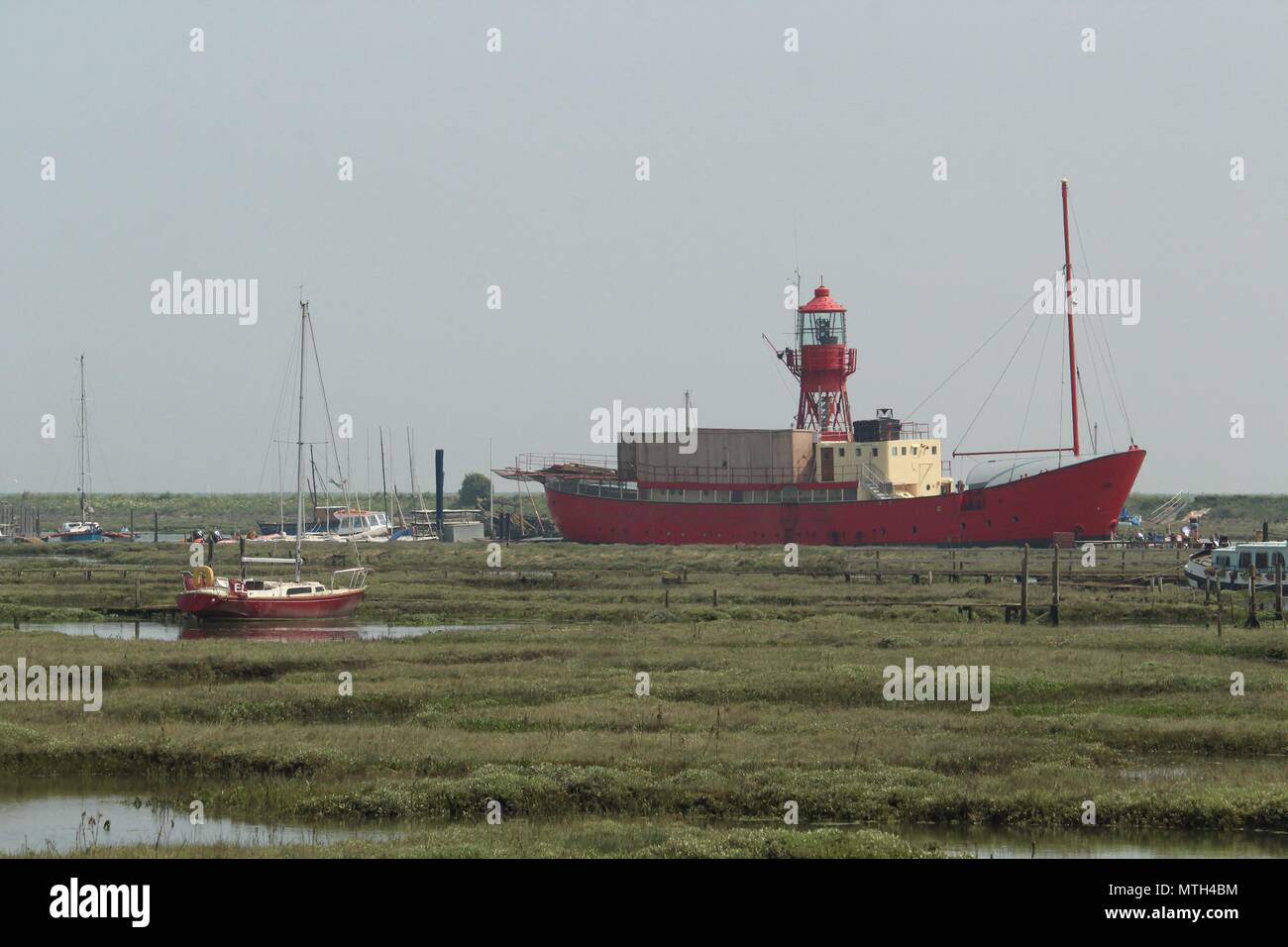 Red Lightship at Tollesbury Wick Marina viewed from across the ...