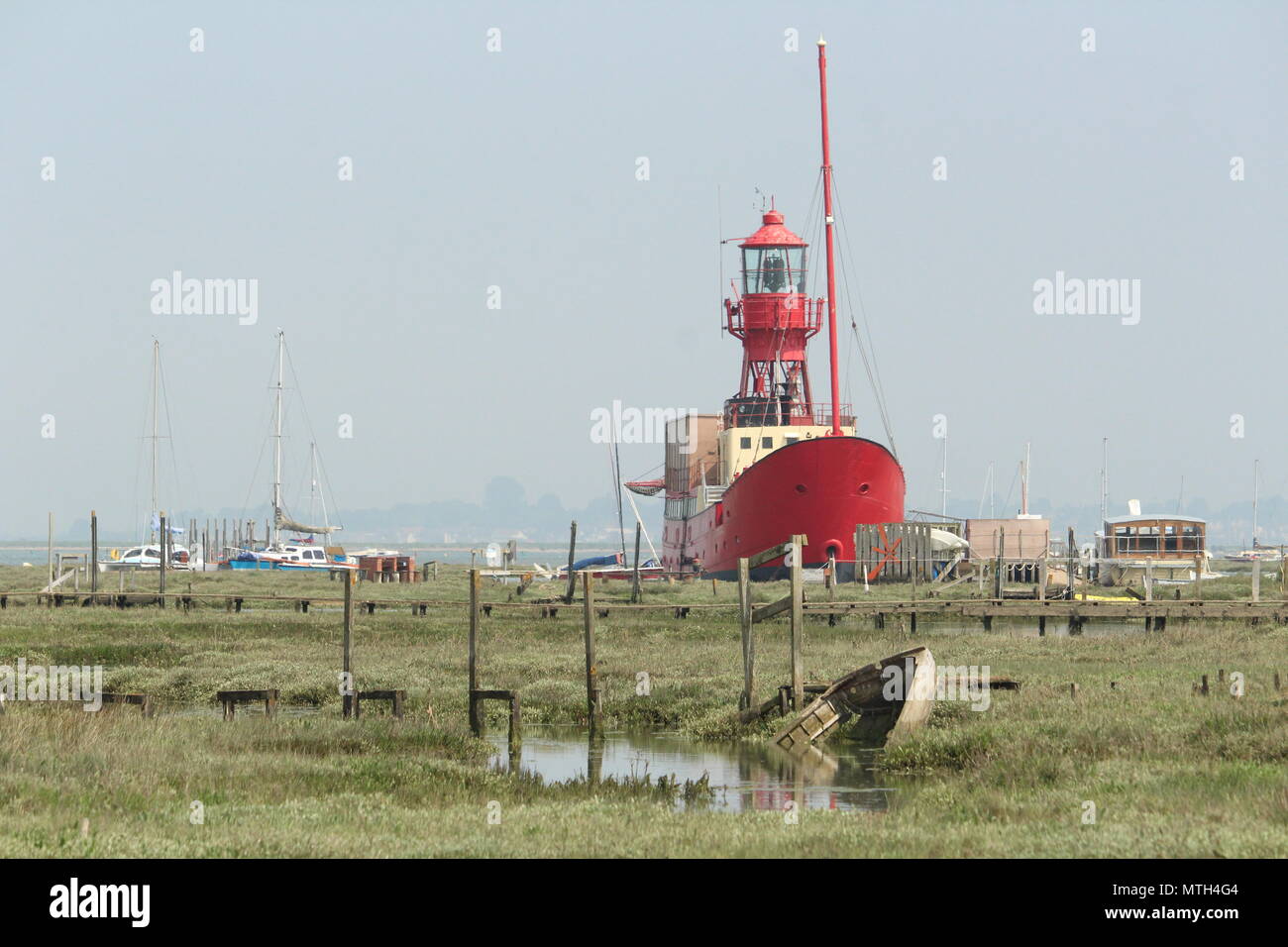 Red Lightship at Tollesbury Wick Marina viewed from across the ...