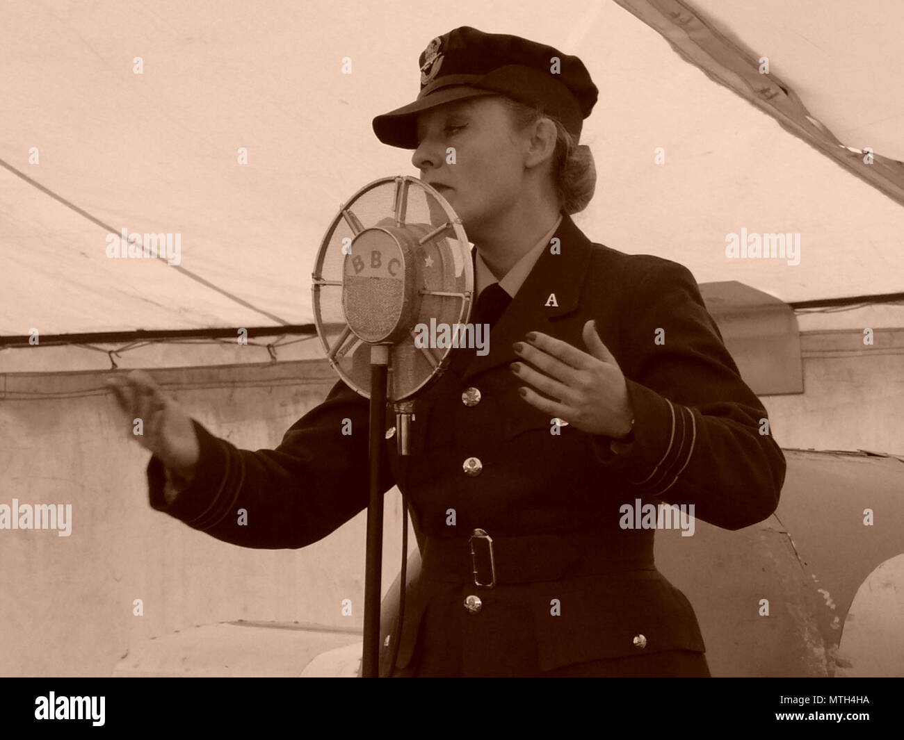 1940s style singer, with BBC microphone Stock Photo - Alamy