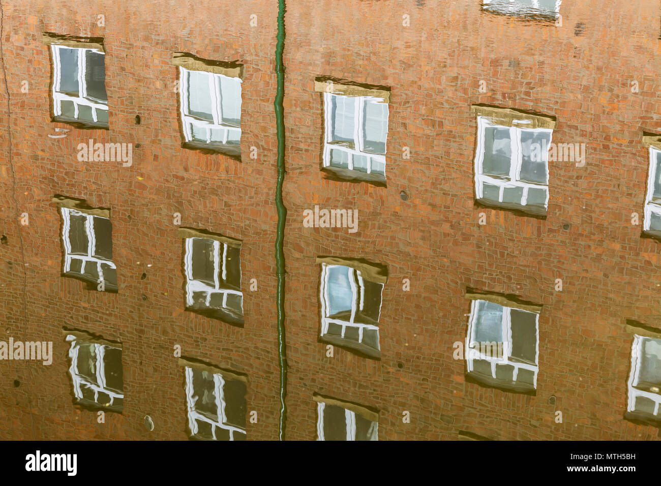 Canal Reflections of Hovis Mill Apartments in Macclesfield Stock Photo ...