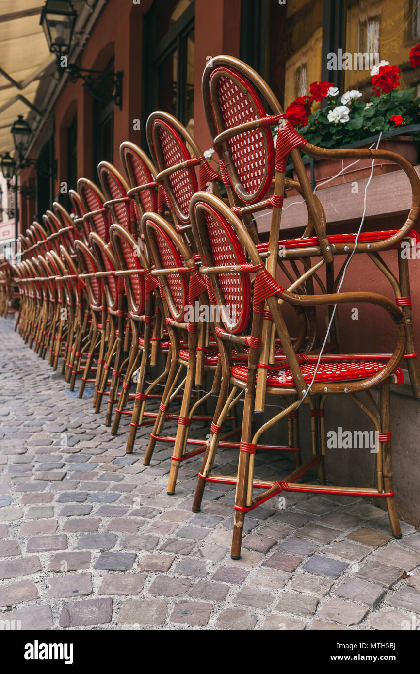 empty chairs in the street near the cafe, European city, low season ...