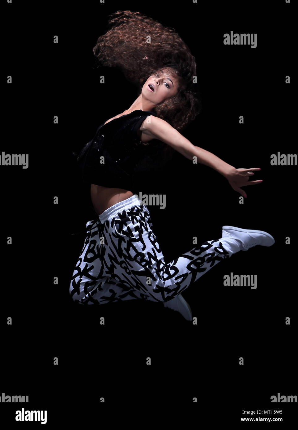 Woman dancing street dance Stock Photo - Alamy