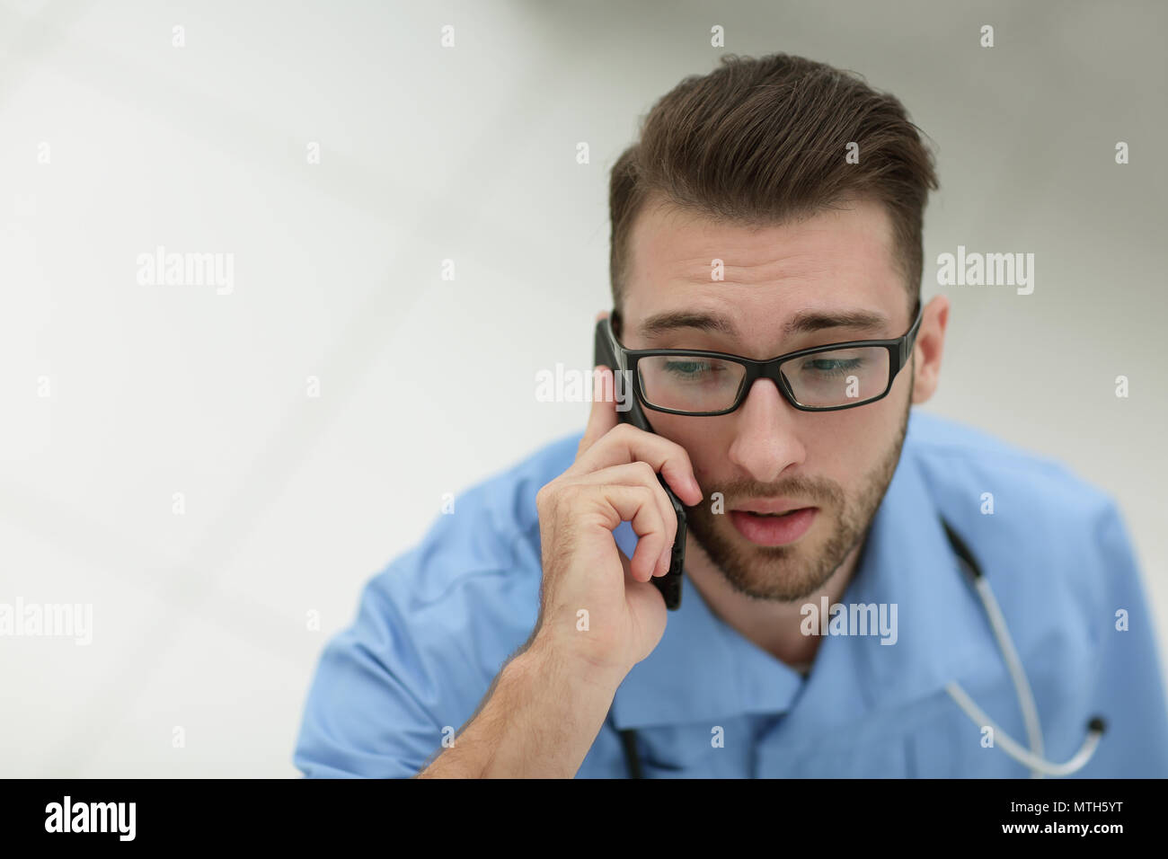 Attractive mature doctor talking on hi-res stock photography and images ...