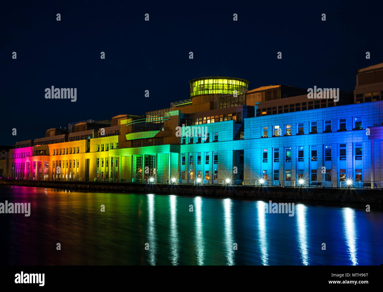 Victoria Quay Scottish Government building, lit in rainbow colours at ...