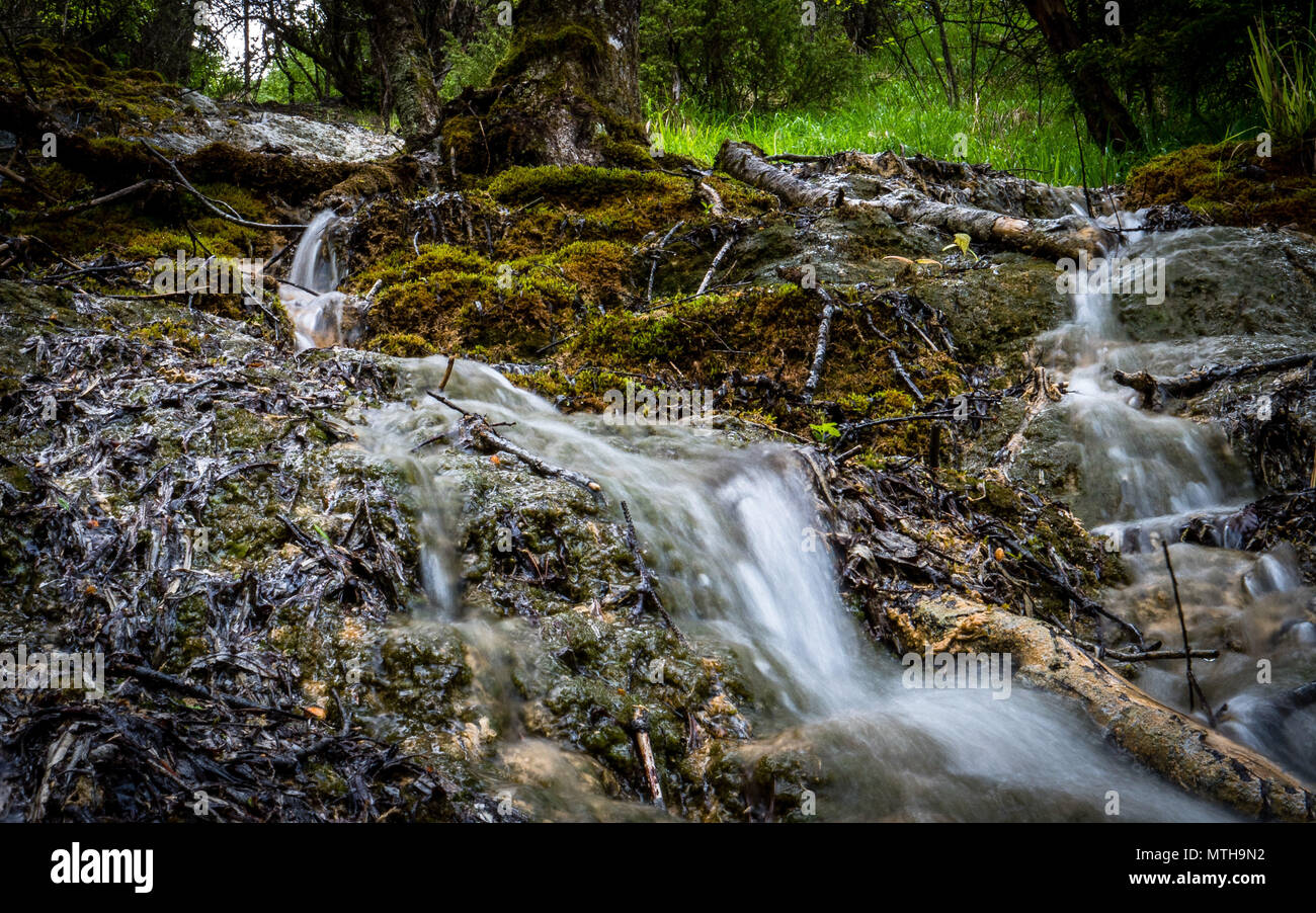 Water stream flow down hill hi-res stock photography and images - Alamy