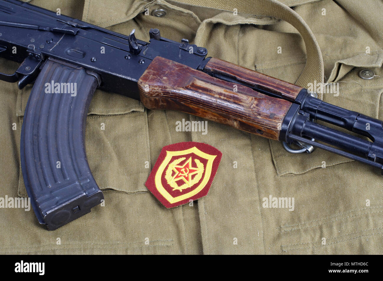 AK47 with Soviet Army Mechanized infantry shoulder patch on khaki ...