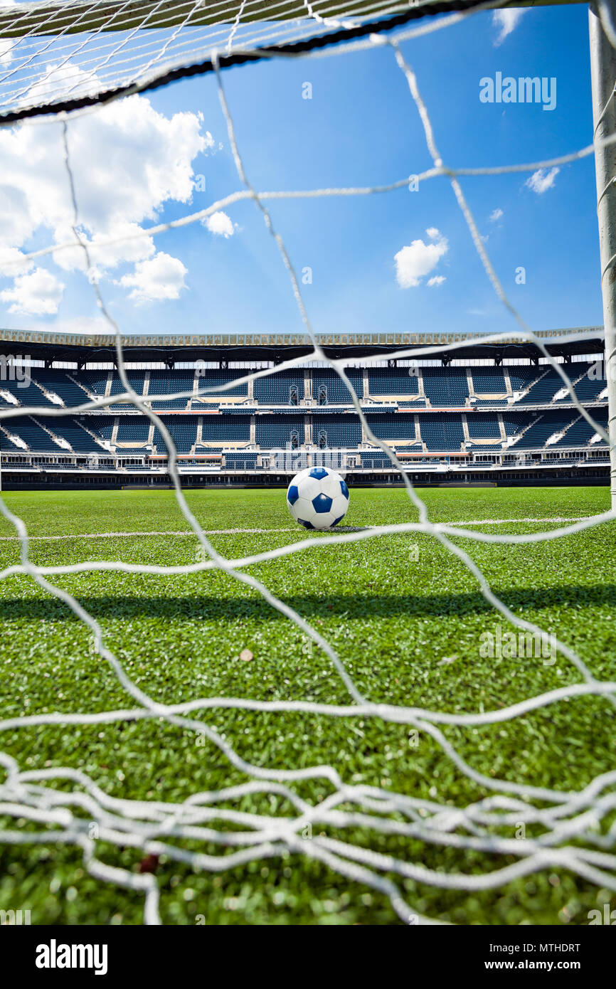 Action goal net behind football hi-res stock photography and images - Alamy