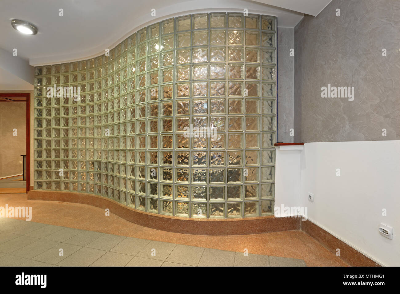 Modern Glass Cube Wave Wall Interior Stock Photo - Alamy